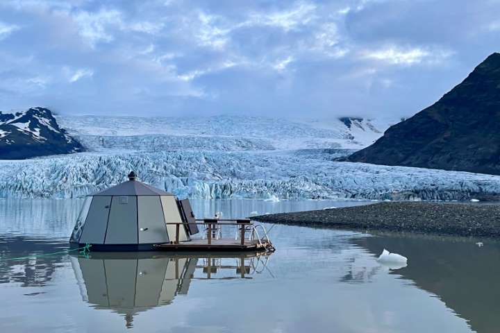 A Glass Igloo Frozen into a Glacier on this Iceland Holiday
